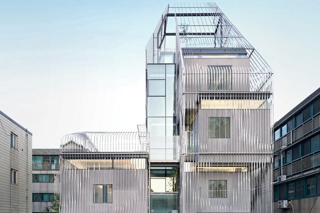 It takes a (vertical) village | Urbis Magazine